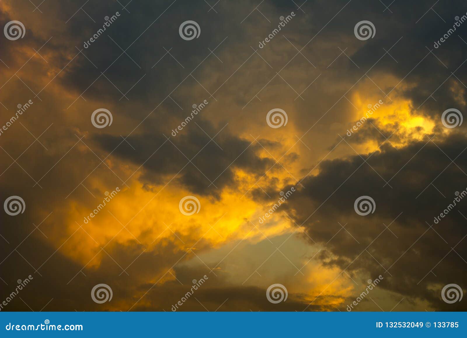 A Bright Orange Gray Storm Clouds in a Dark Sunset Sky. Rain Clouds in ...