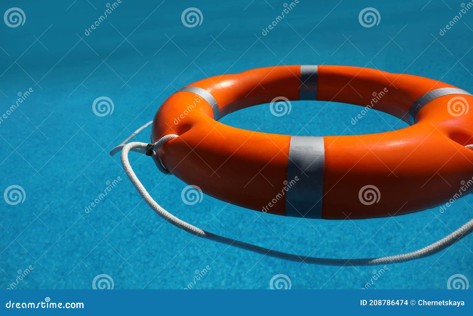 Bright Orange Inflatable Ring Floating in Swimming Pool Stock Photo ...