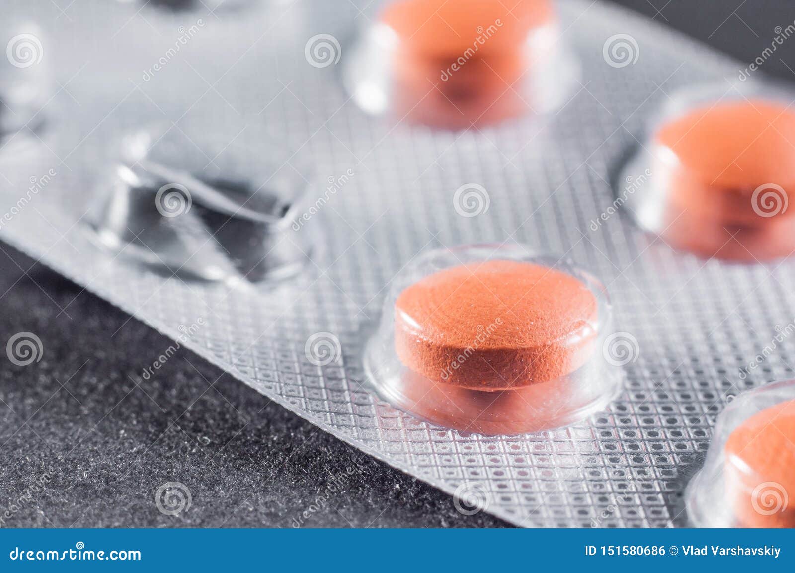 Bright Orange Pills in Sticks with One Empty Cell Used, Closeup Stock ...