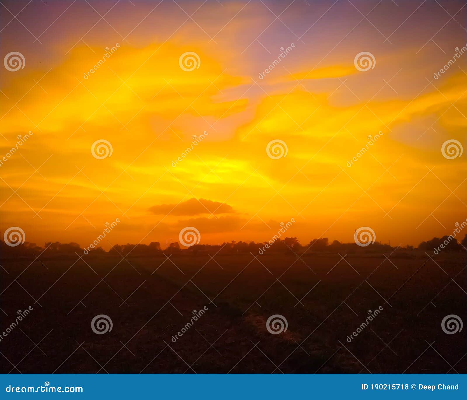 Bright Orange Sunset with Field on Back Stock Photo - Image of dusk ...