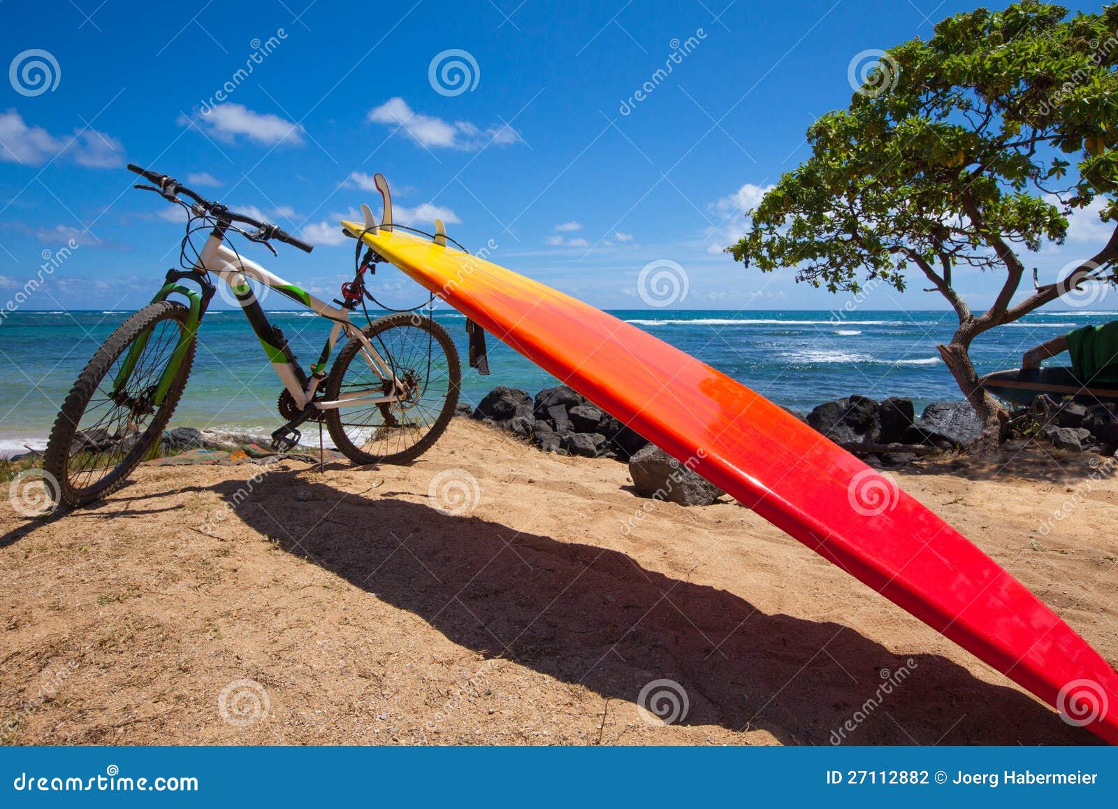 Bright Orange Surfboard and Mountain Bike on Beach Stock Photo - Image ...