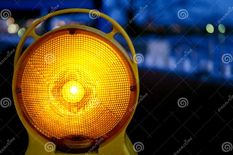 Bright Orange Warning Light on a Construction Site Stock Image - Image ...