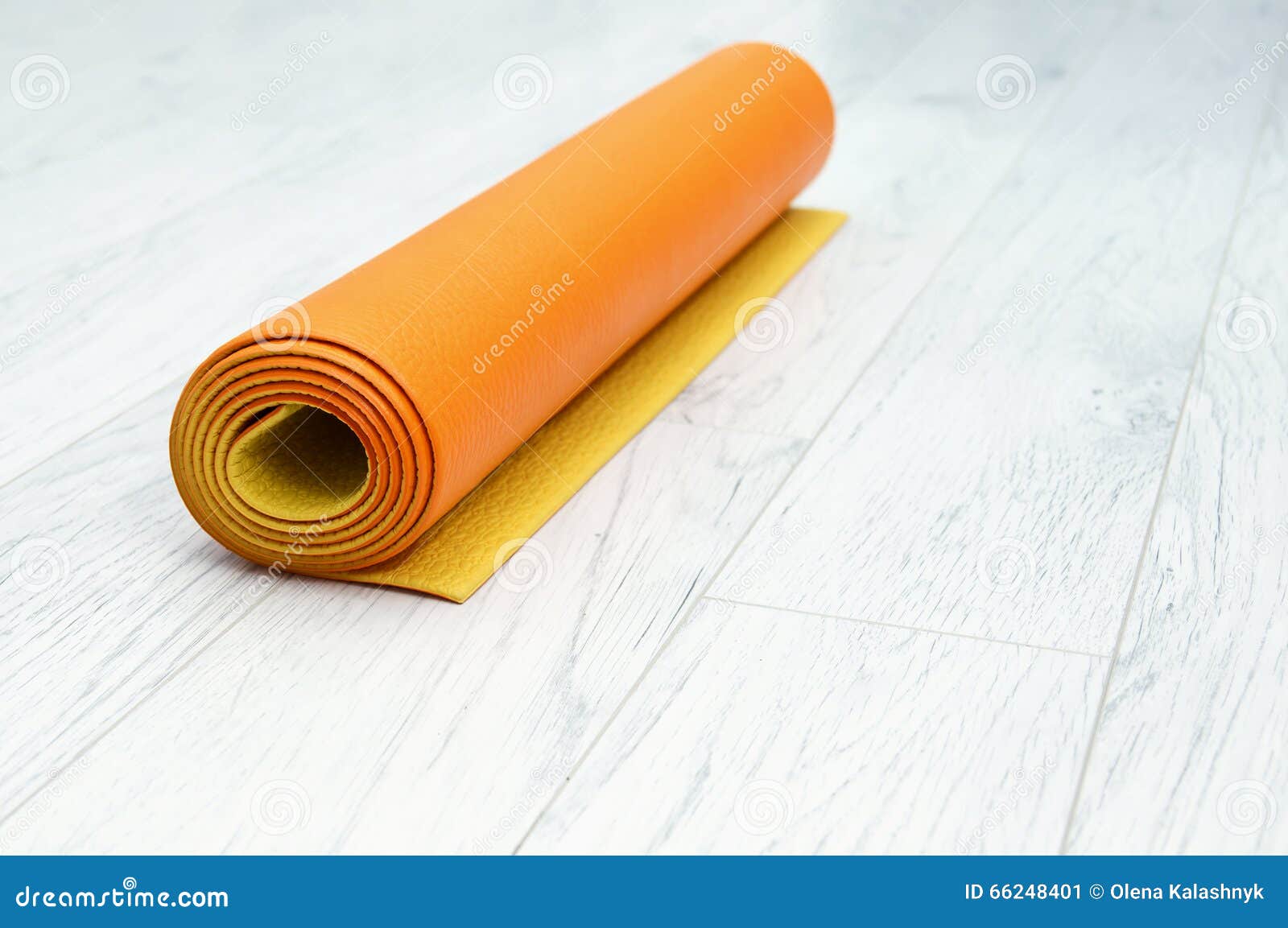 Bright Orange Yoga Mat on a Light Gray Laminate Stock Image - Image of ...