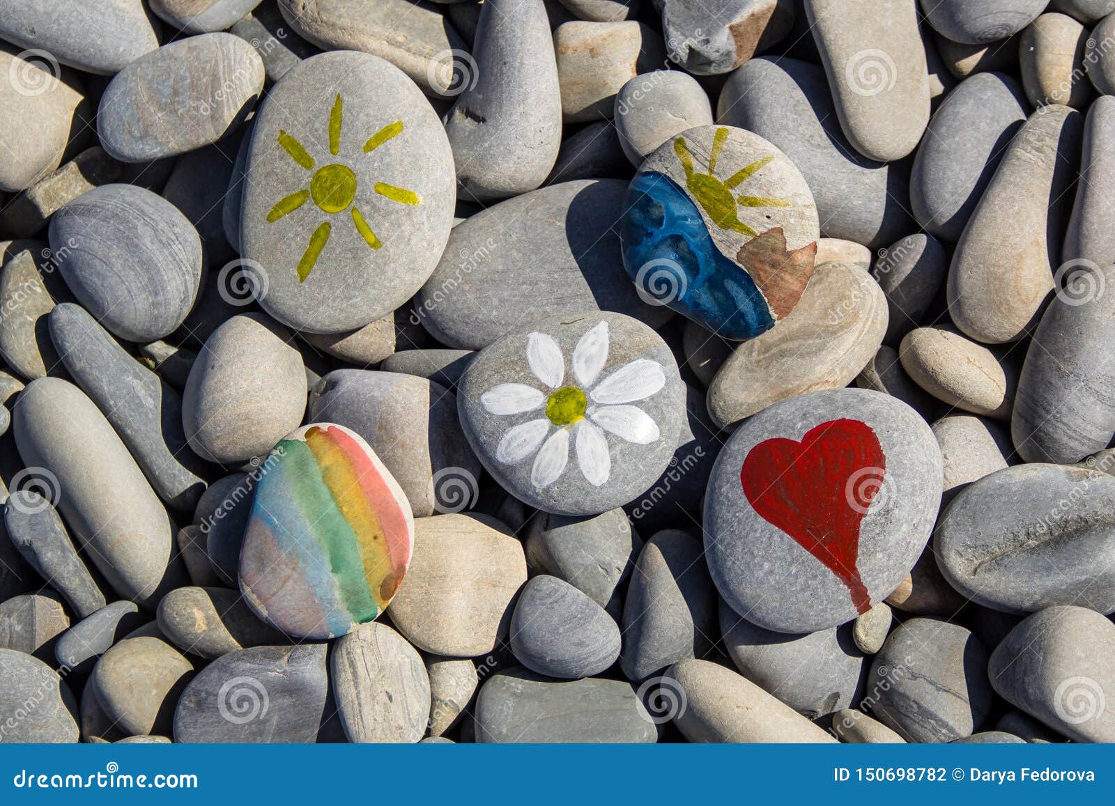 Bright Painted on Pebble. Pebbles and Sea Background Stock Photo ...