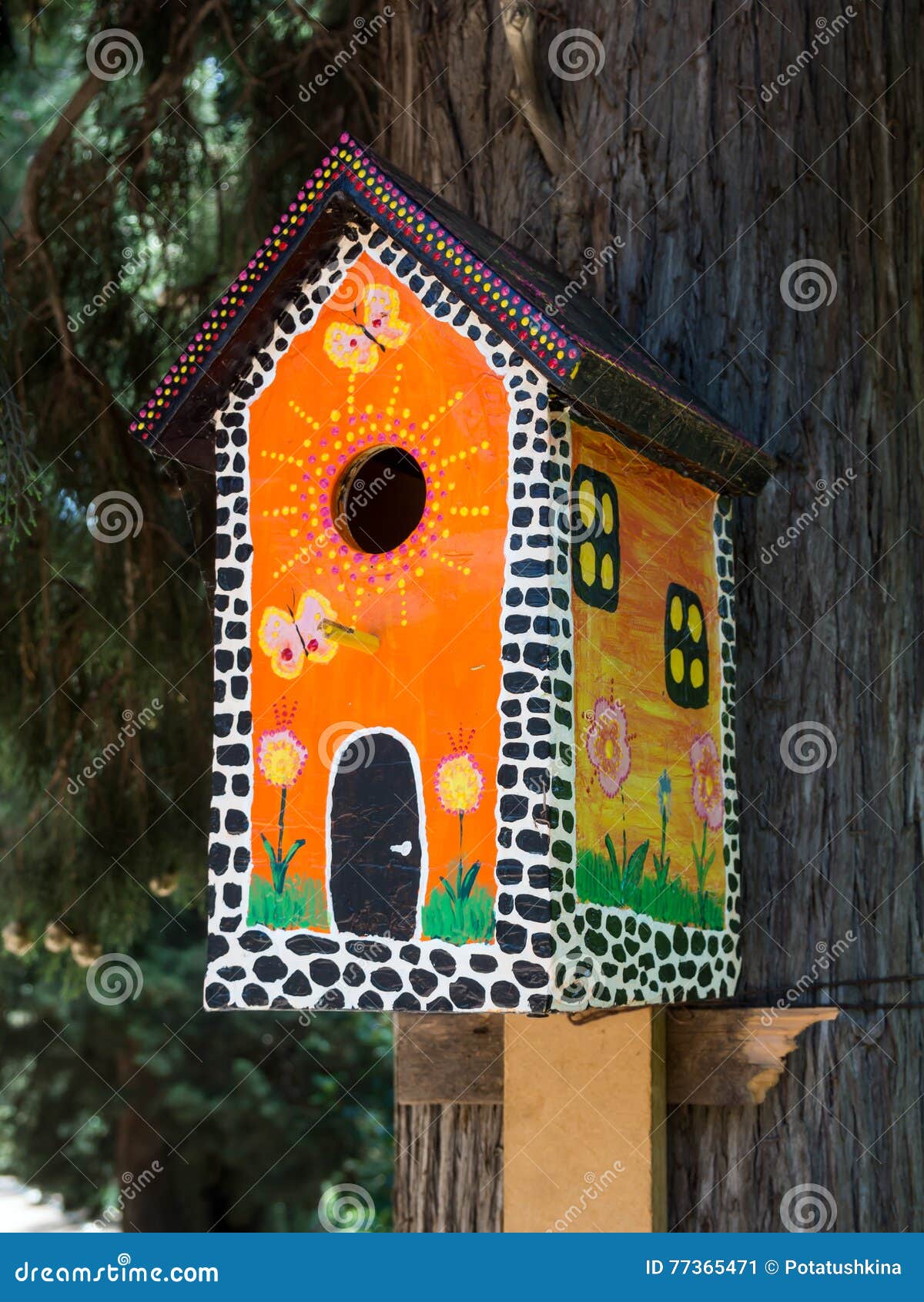 Bright, Painted Under the Multi-storey House, Birdhouse on a Tree Trunk ...