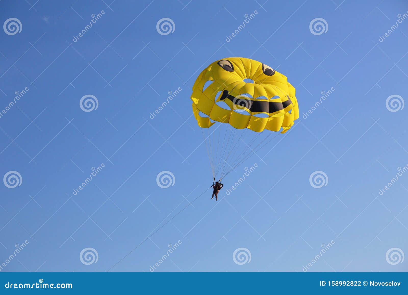 Bright Parachute in the Sky Stock Photo - Image of nature, parasail ...