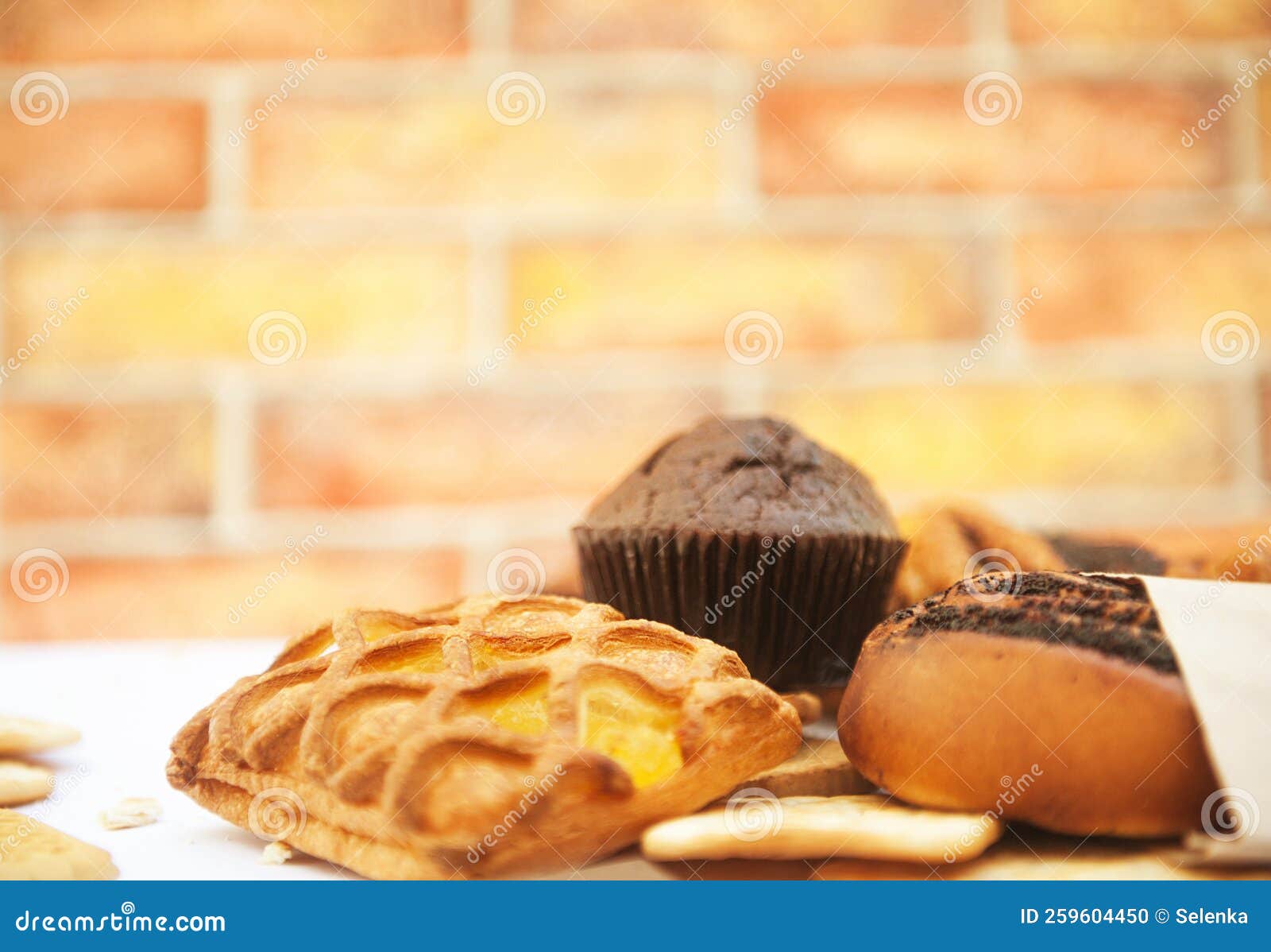 Bright Pastries in Outdoor Cafe with Brick Wall on a Backdrop Stock ...