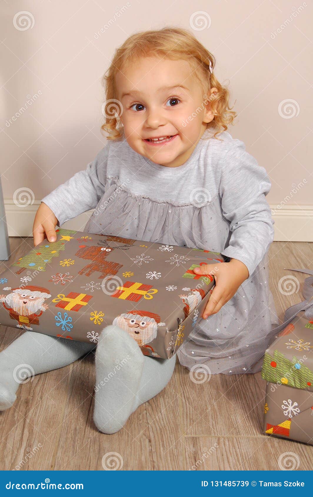 Happy child with gift box. stock image. Image of kids - 131485739