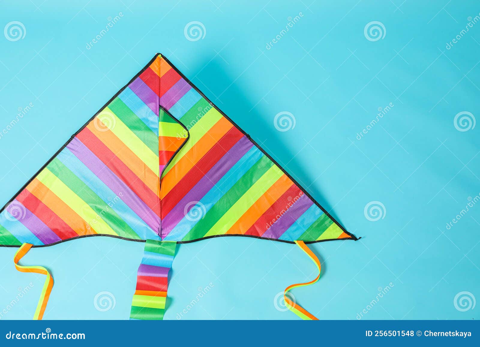 Bright Rainbow Kite on Light Blue Background, Top View Stock Photo ...