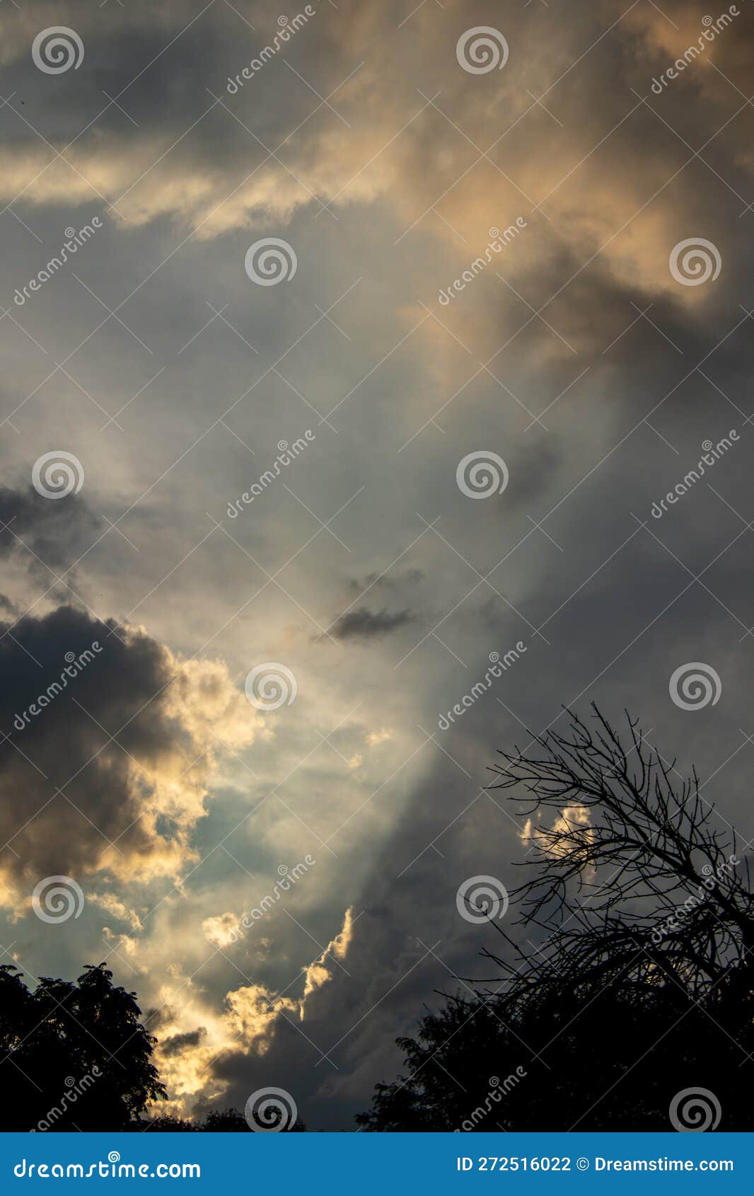 Bright Rays of Sun Break through Dark Clouds Stock Photo - Image of ...