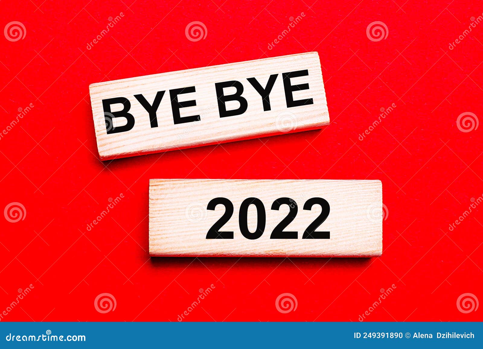 On a Bright Red Background, There are Two Light Wooden Blocks with the ...