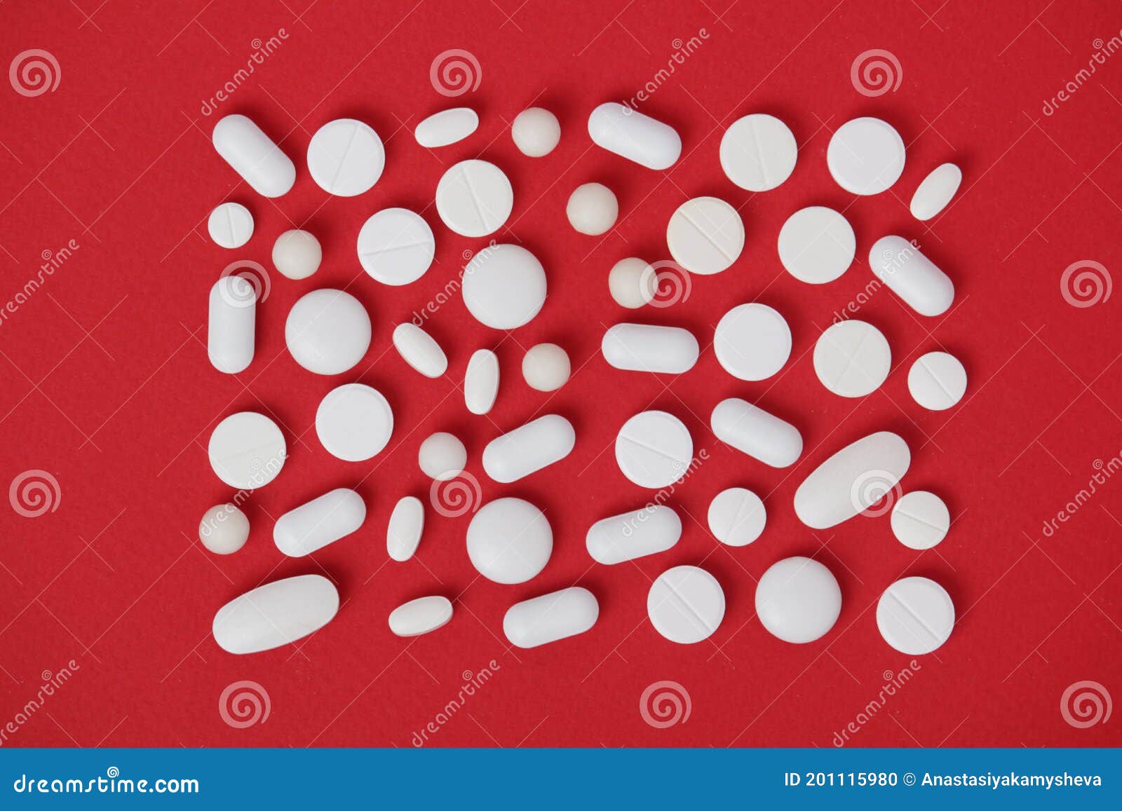 Bright Red Background with White Medicine Tablets Stock Photo - Image ...