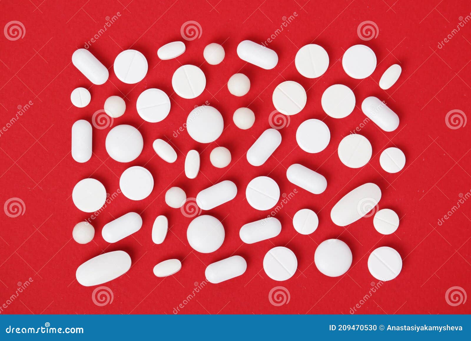 Bright Red Background with White Medicine Tablets Stock Photo - Image ...