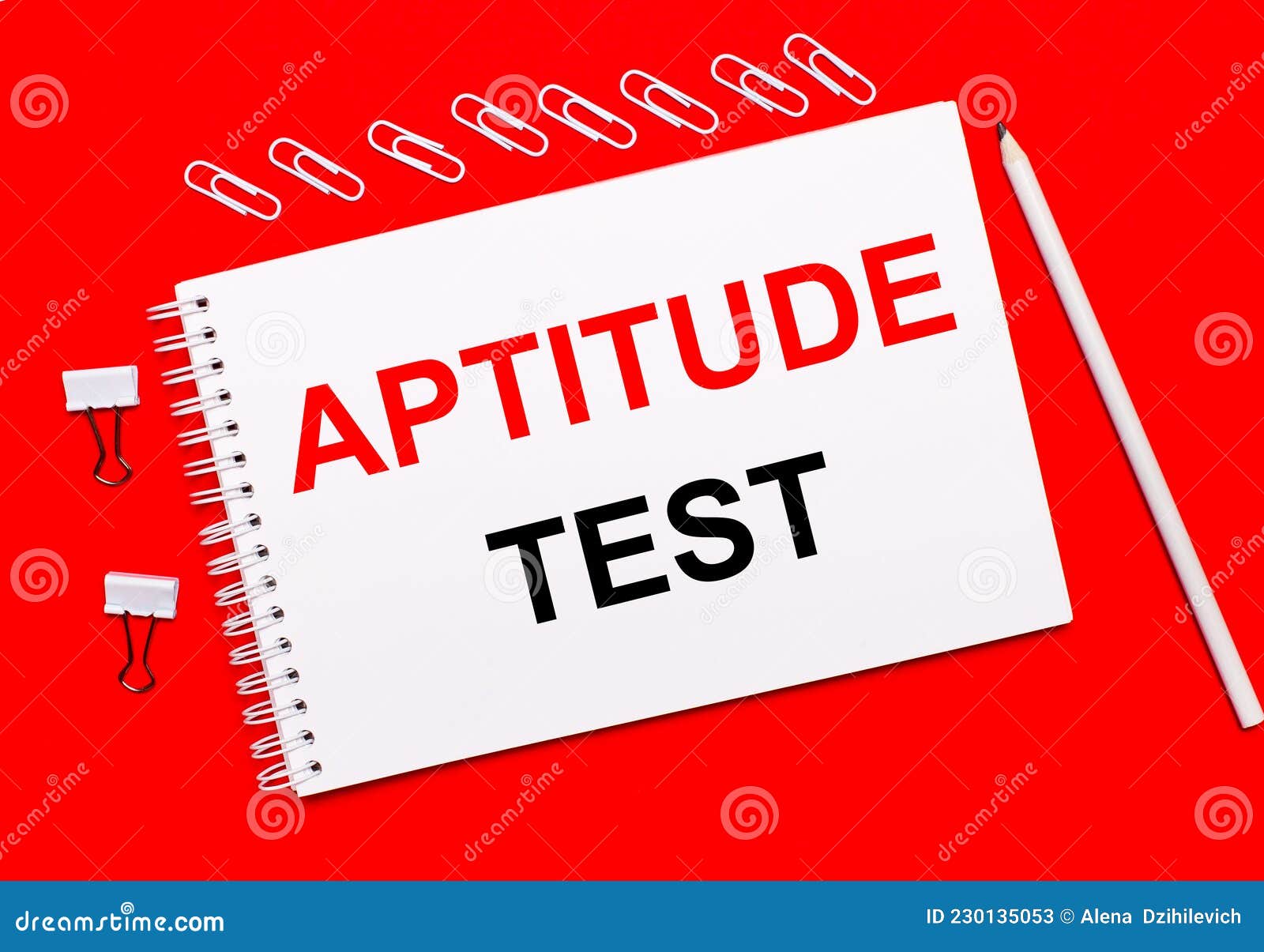 On a Bright Red Background, a White Pencil, White Paper Clips, and a ...