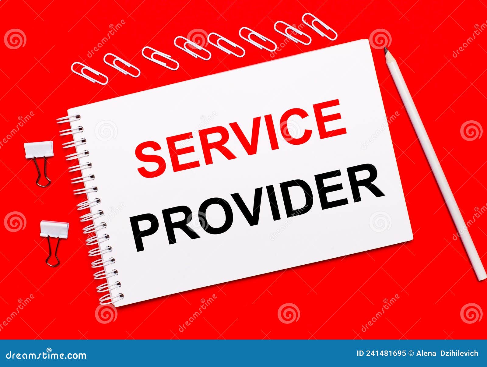 On a Bright Red Background, a White Pencil, White Paper Clips, and a ...