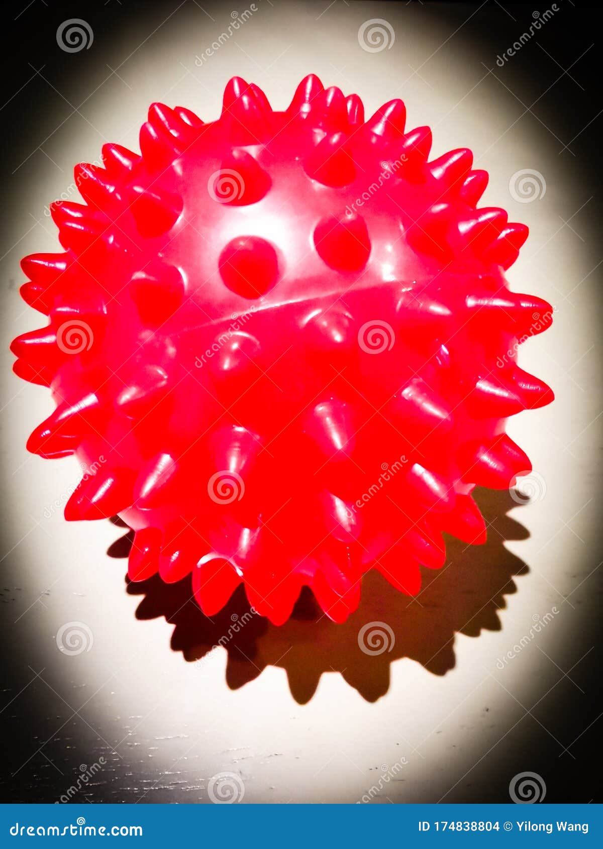 Bright Red Ball Under Light with Shadow Stock Photo - Image of shadow ...