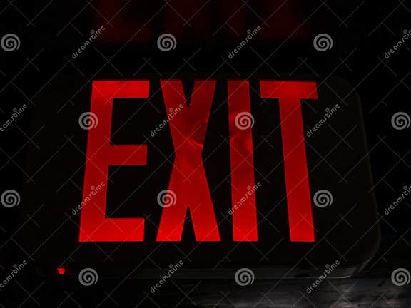 A bright red `EXIT` sign stock photo. Image of letter - 166440512