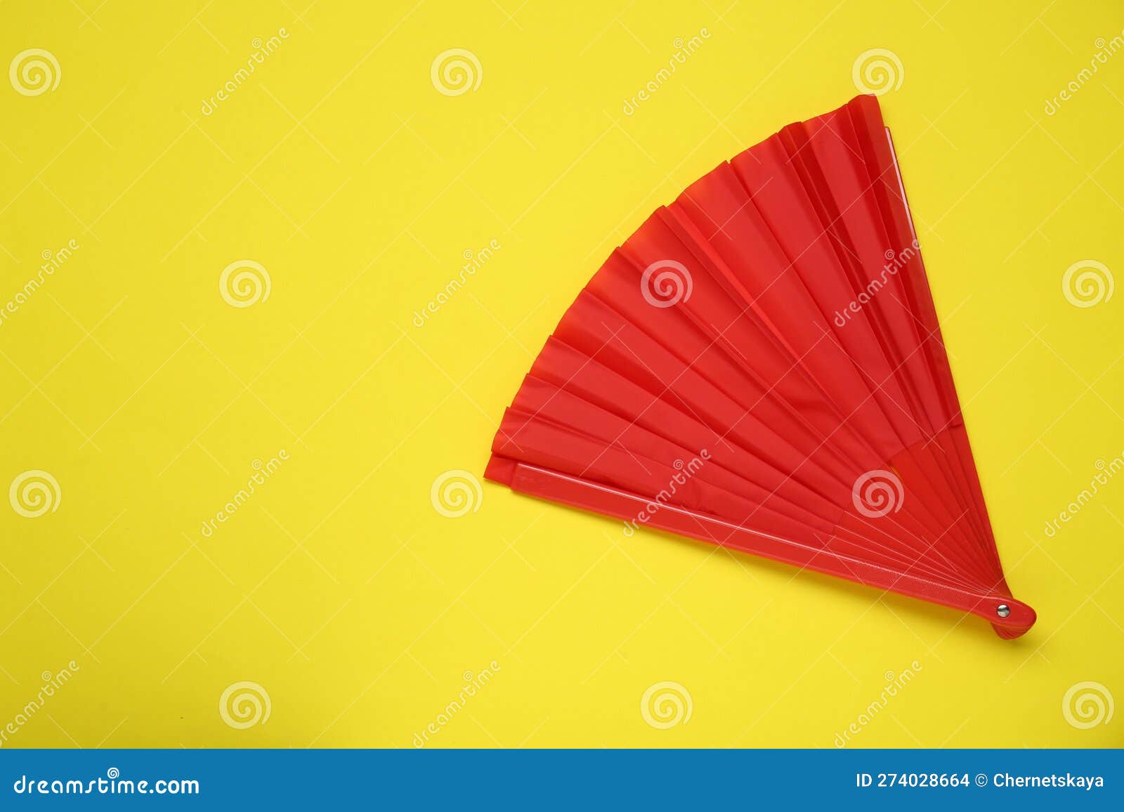 Bright Red Hand Fan on Yellow Background, Top View. Space for Text ... Bright Red Hand Fan on Yellow Background, Top View. Space for Text ...