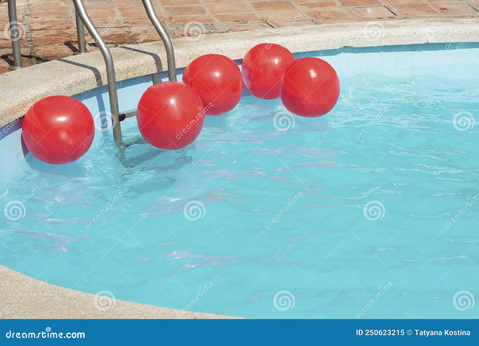 Bright Red Inflatable Balls Float On The Surface Of The Laurel Water In ...