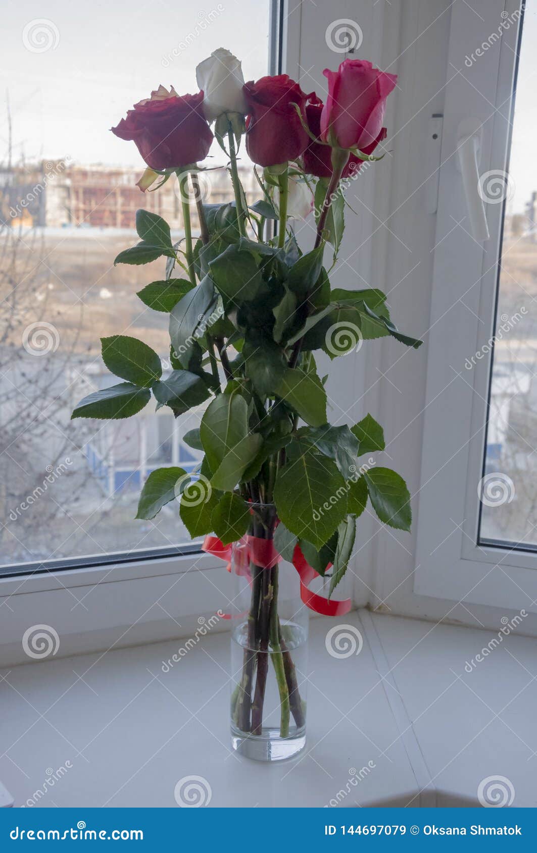 Bright Red, Orange, Pink and White Roses in the Bouquet Stock Image ...