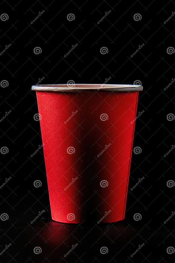 A Bright Red Paper Cup Sits Atop a Table, Ready for Use Stock Image ...
