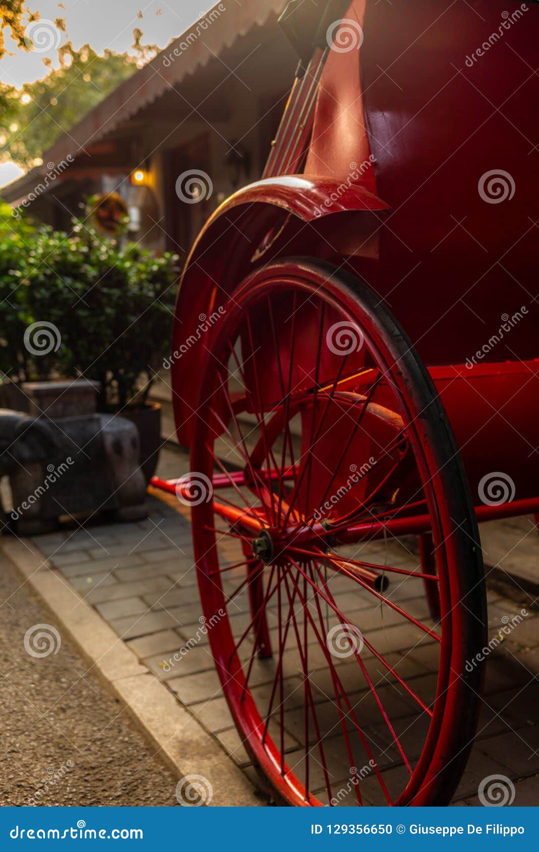 A Bright Red Rickshaw in a Back Alley in a Beijing Hutong - 2 Stock ...