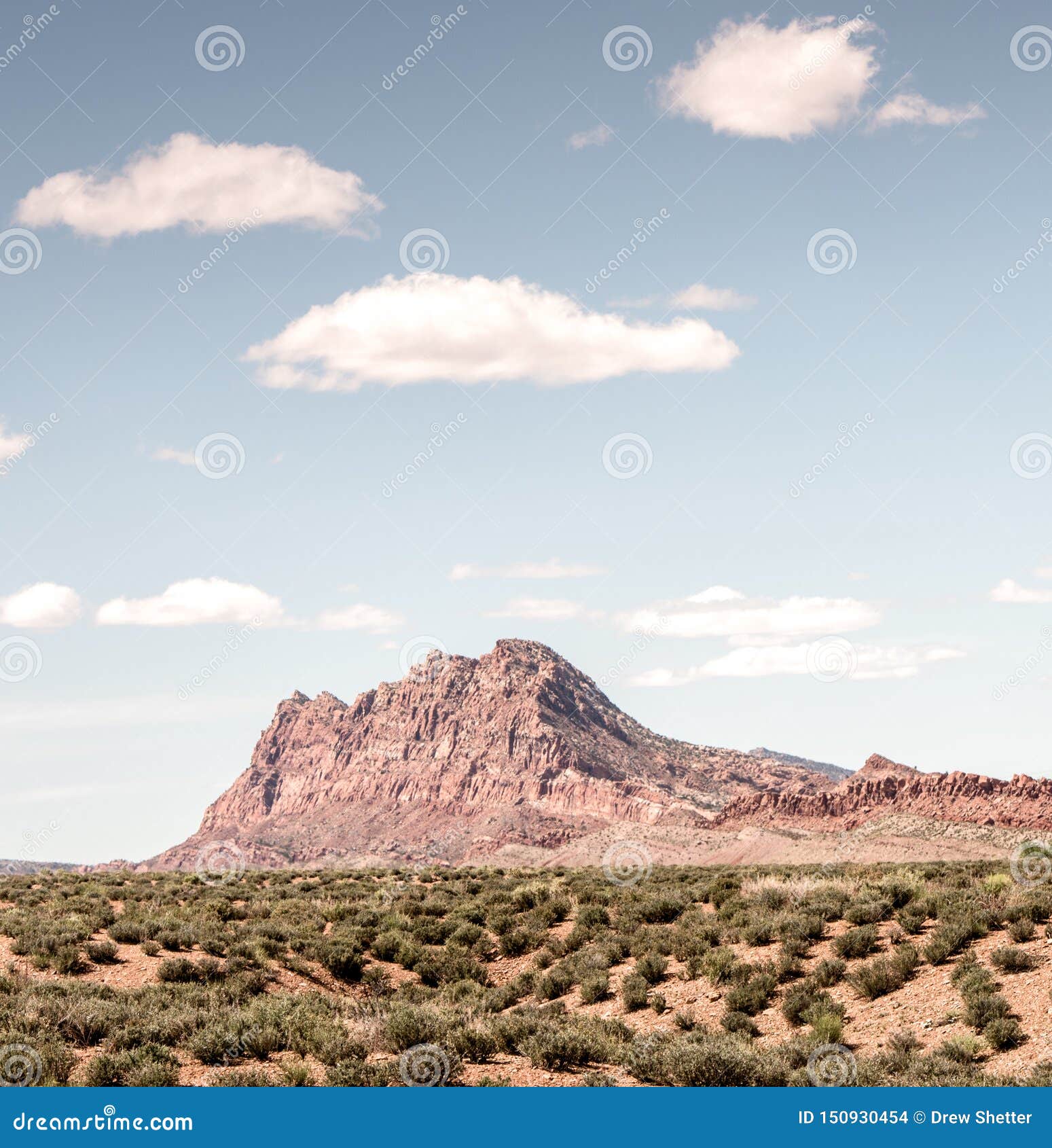 Bright Red Rock Mountain with Small Clouds in Arizona Stock Photo ...