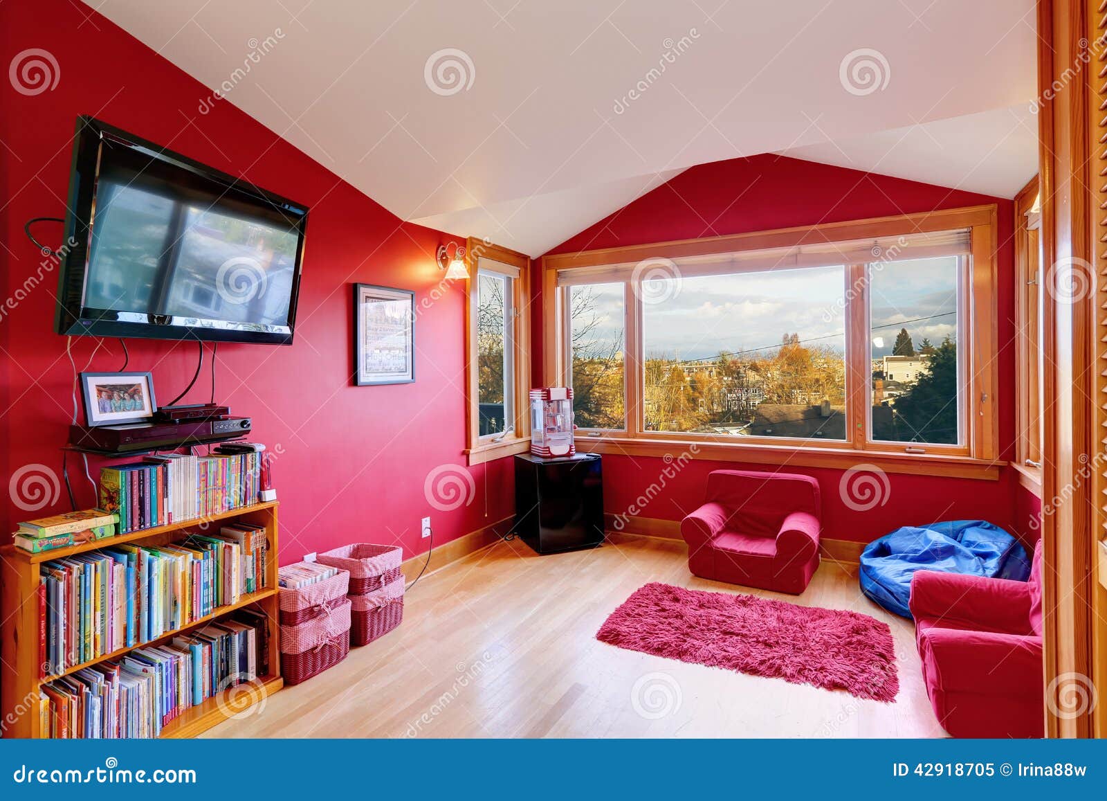 Bright red room with tv stock image. Image of building - 42918705