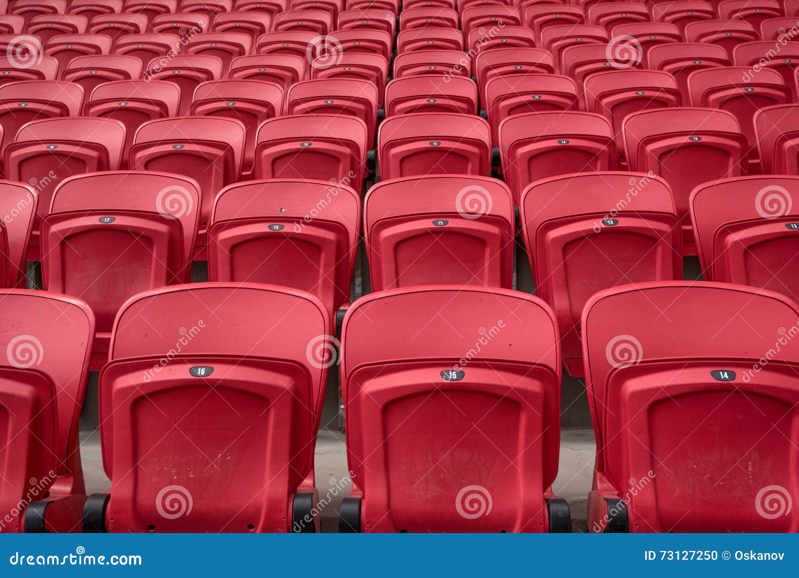 Bright red stadium seat stock photo. Image of outdoors - 73127250