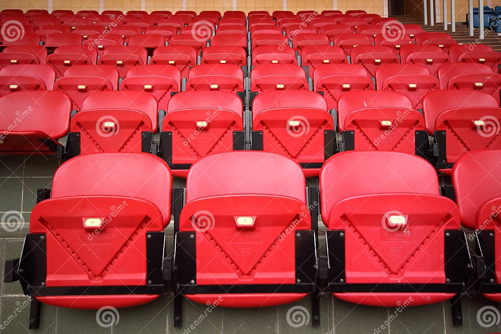 Bright red stadium seats stock photo. Image of stadium - 23812884