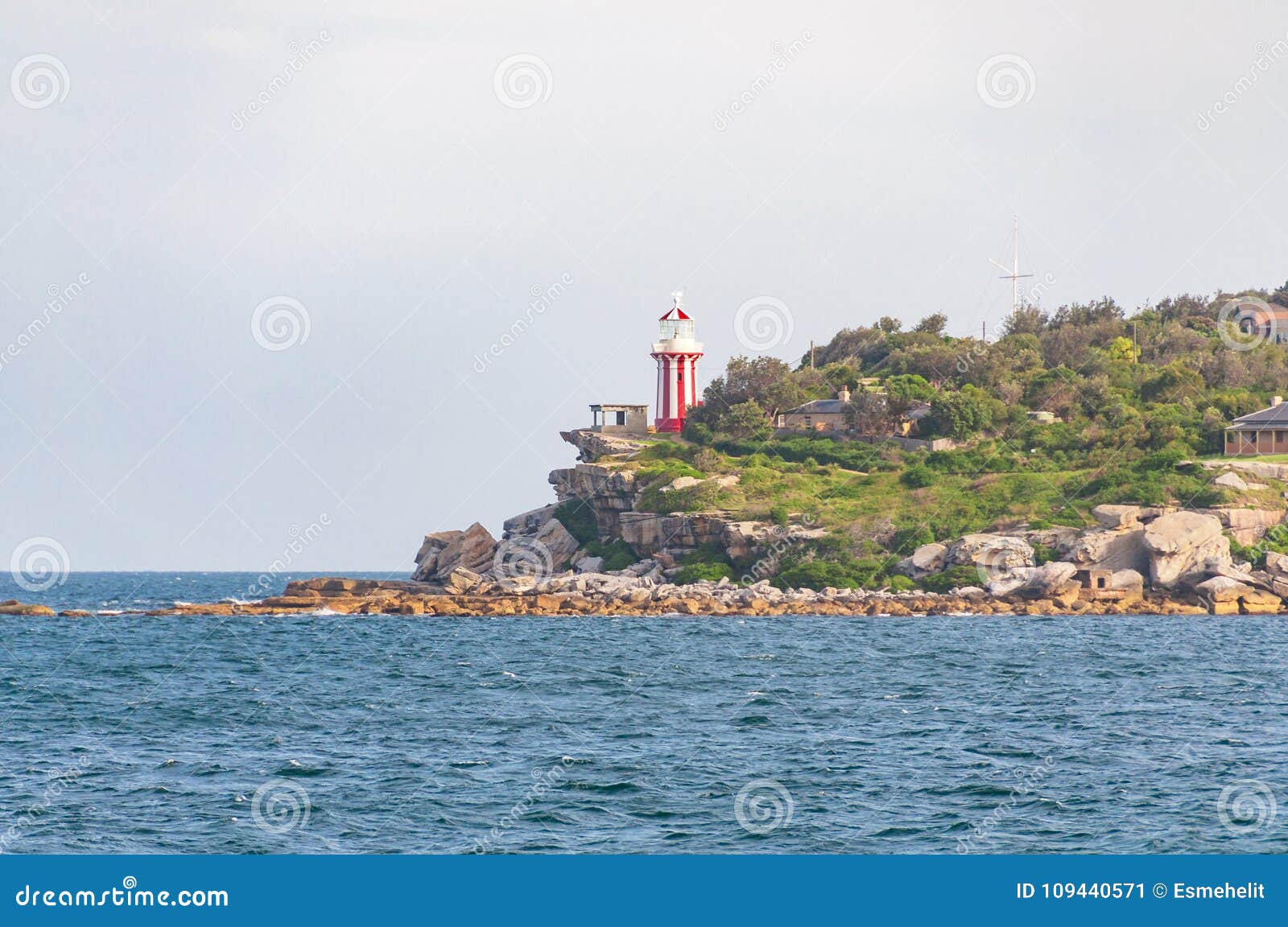 Bright Red and White Lighthouse on a Cliff Stock Image - Image of ocean ...