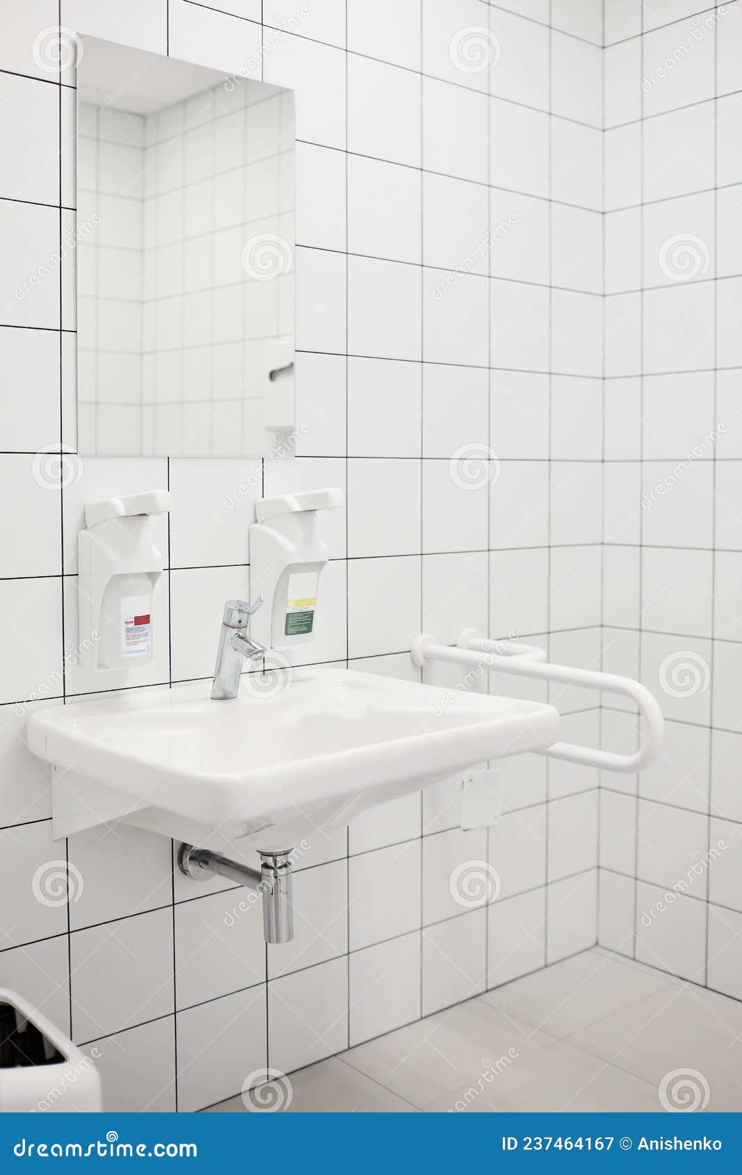 A Bright Restroom in a Medical Facility Stock Image - Image of washroom ...