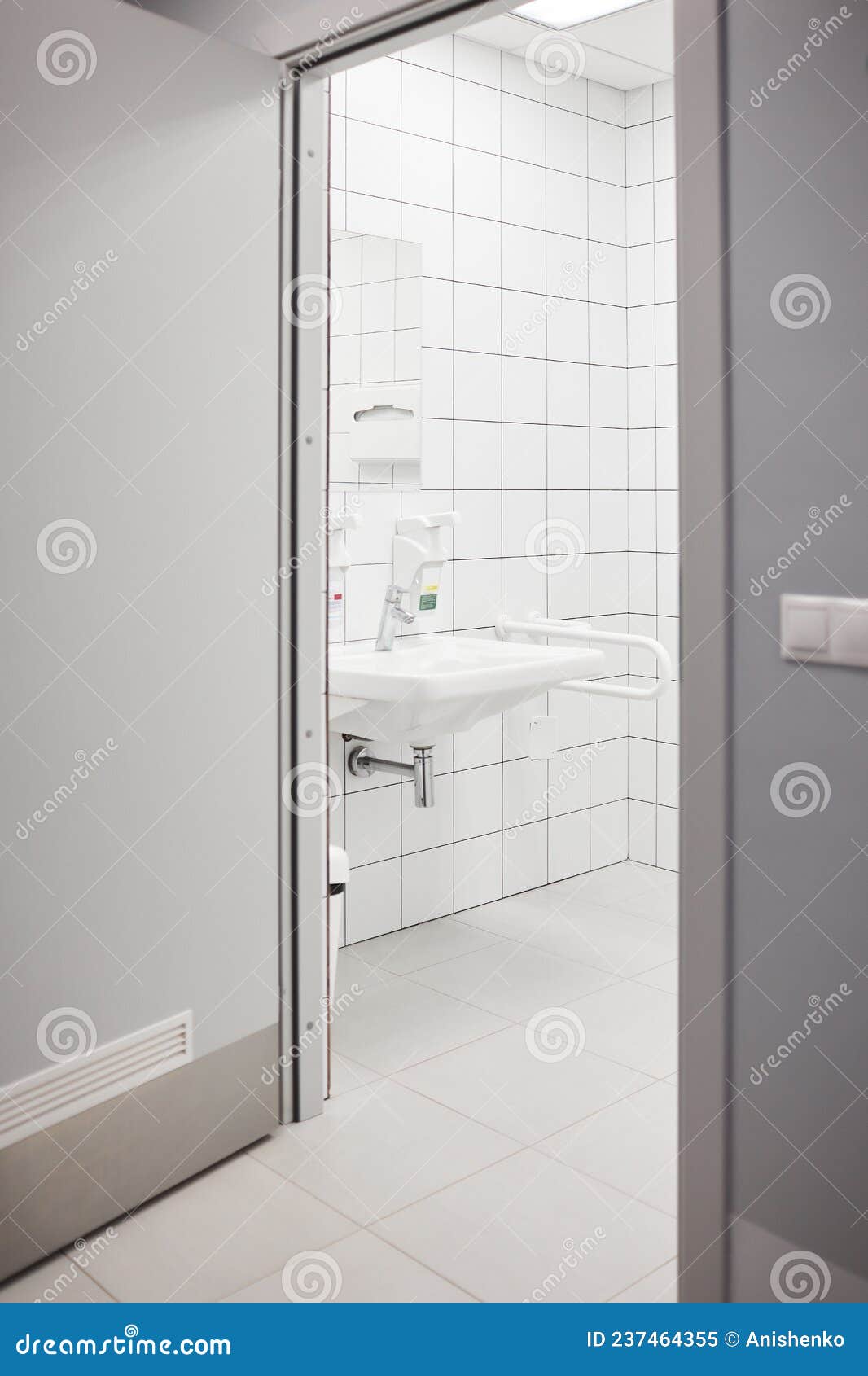 A Bright Restroom in a Medical Facility Stock Image - Image of handrail ...