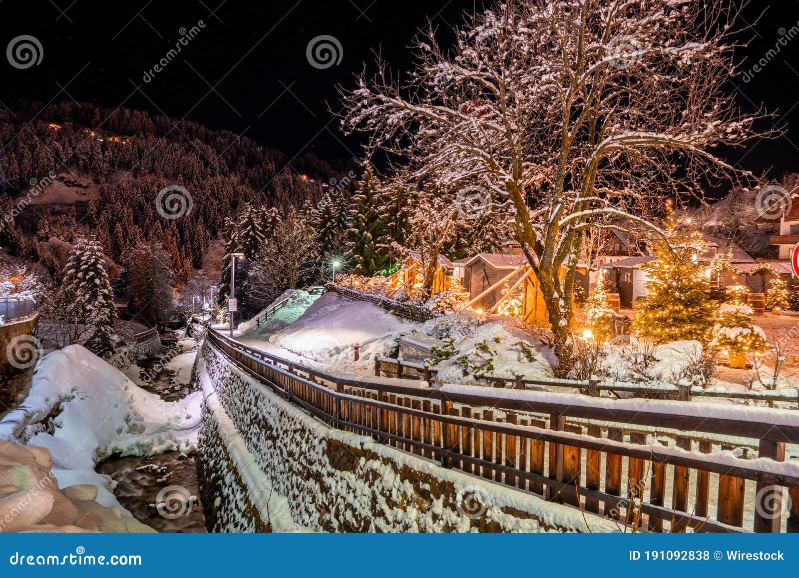 Bright Small Town in the Mountains with Christmas Decorations, Covered ...