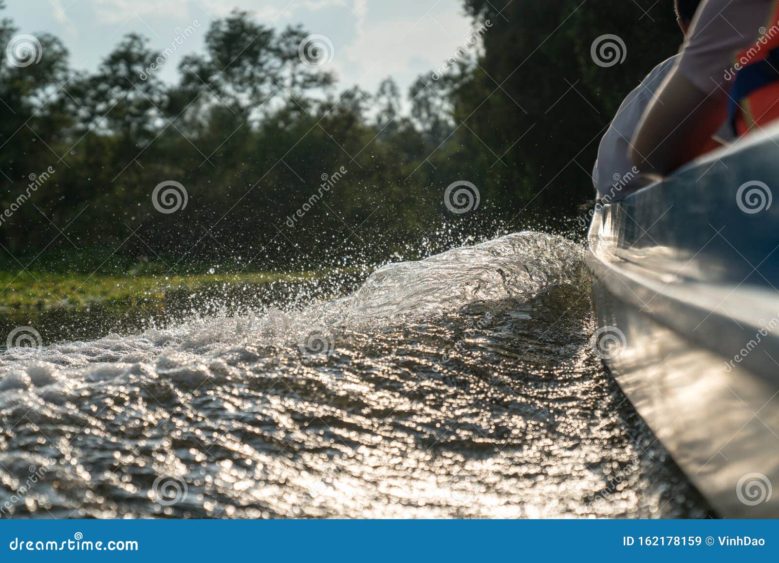 Bright Splash from River Water with Side Edge of Travel Speed Boat ...