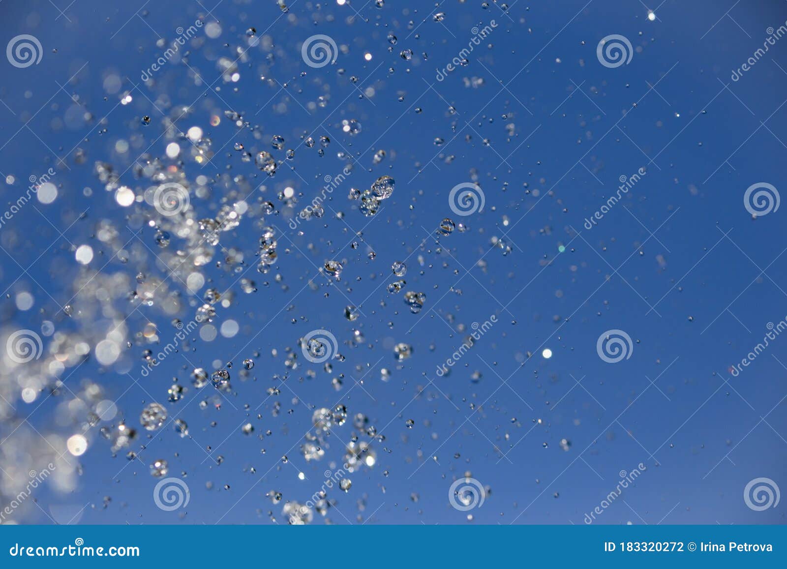 Bright Splash of Water Against the Blue Sky Stock Photo - Image of ...