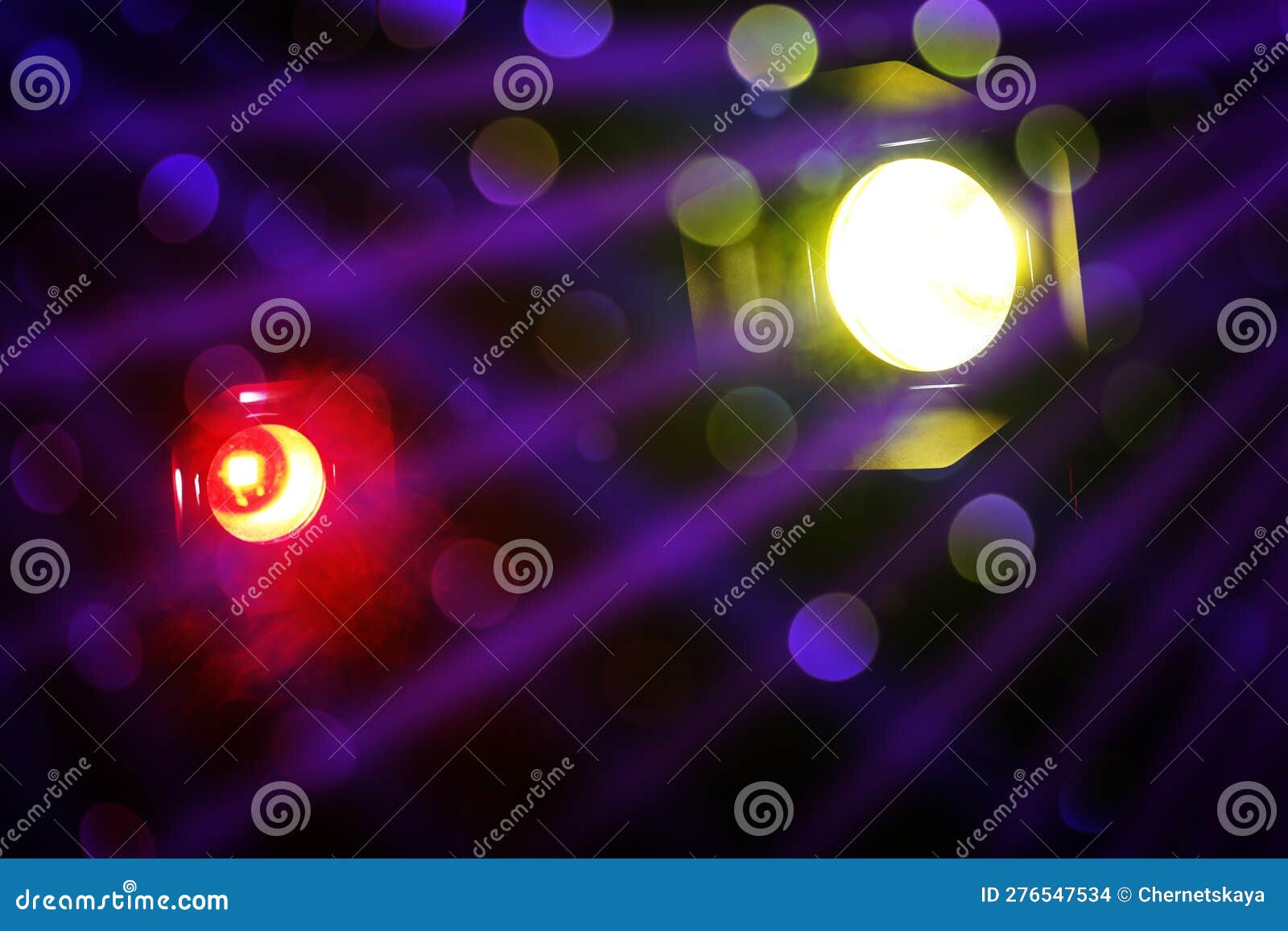 Bright Spotlights and Beams of Light in Night Club, Bokeh Effect Stock ...