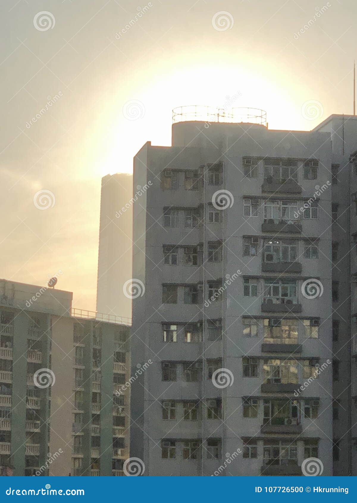 Bright Sun Behind a Building Stock Photo - Image of foreground ...