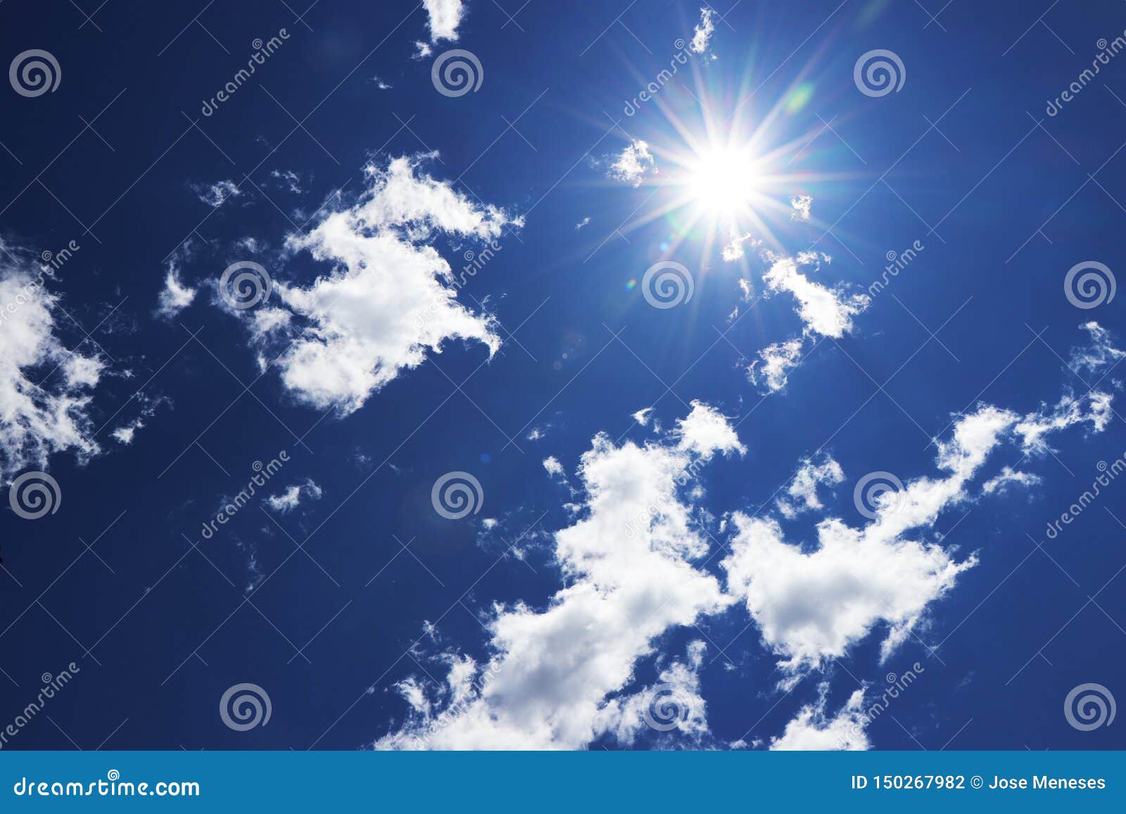 Bright sun on a blue sky stock photo. Image of wild - 150267982