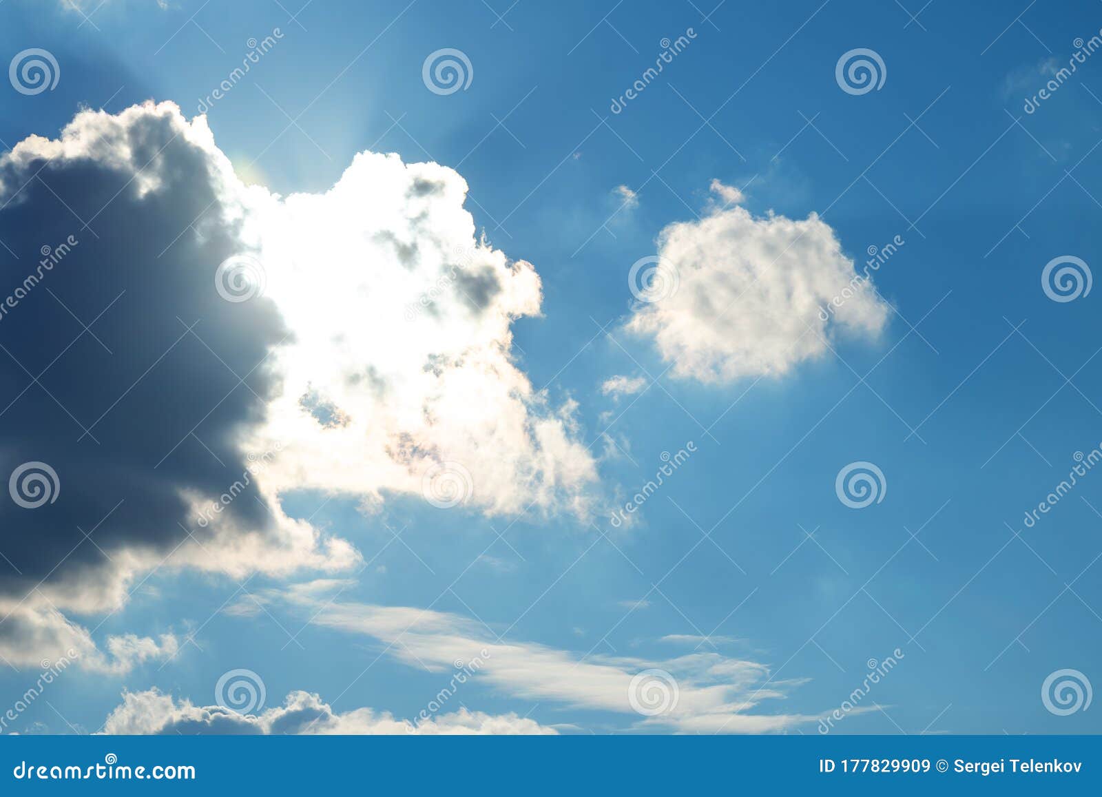 The Bright Sun Breaks through the White Cloud, the Rays of the Sun ...