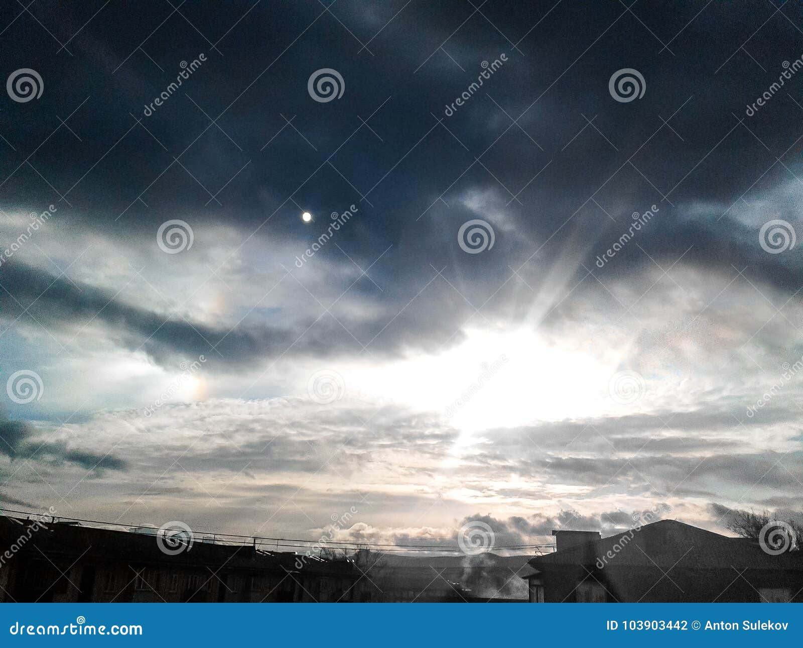 Sunset of two suns stock photo. Image of dramatic, lightning - 103903442