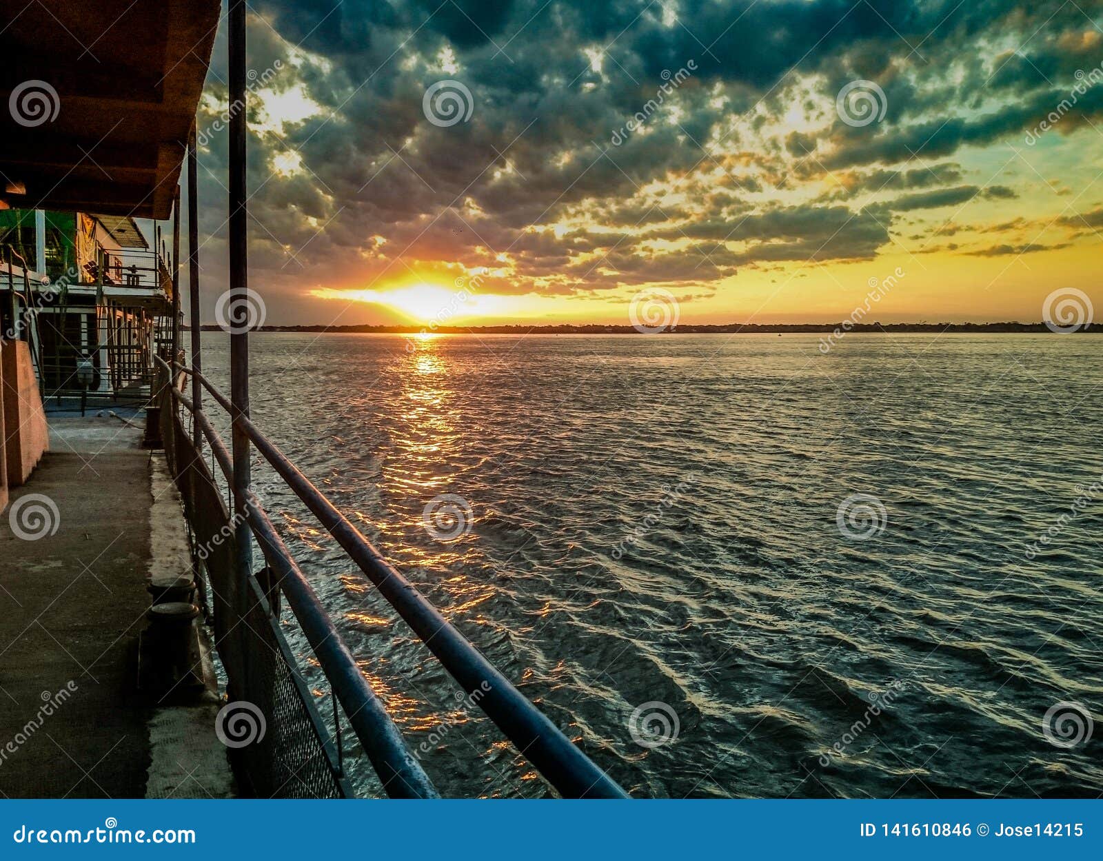 Bright Sun and Clouds Over the River Stock Photo - Image of dark ...