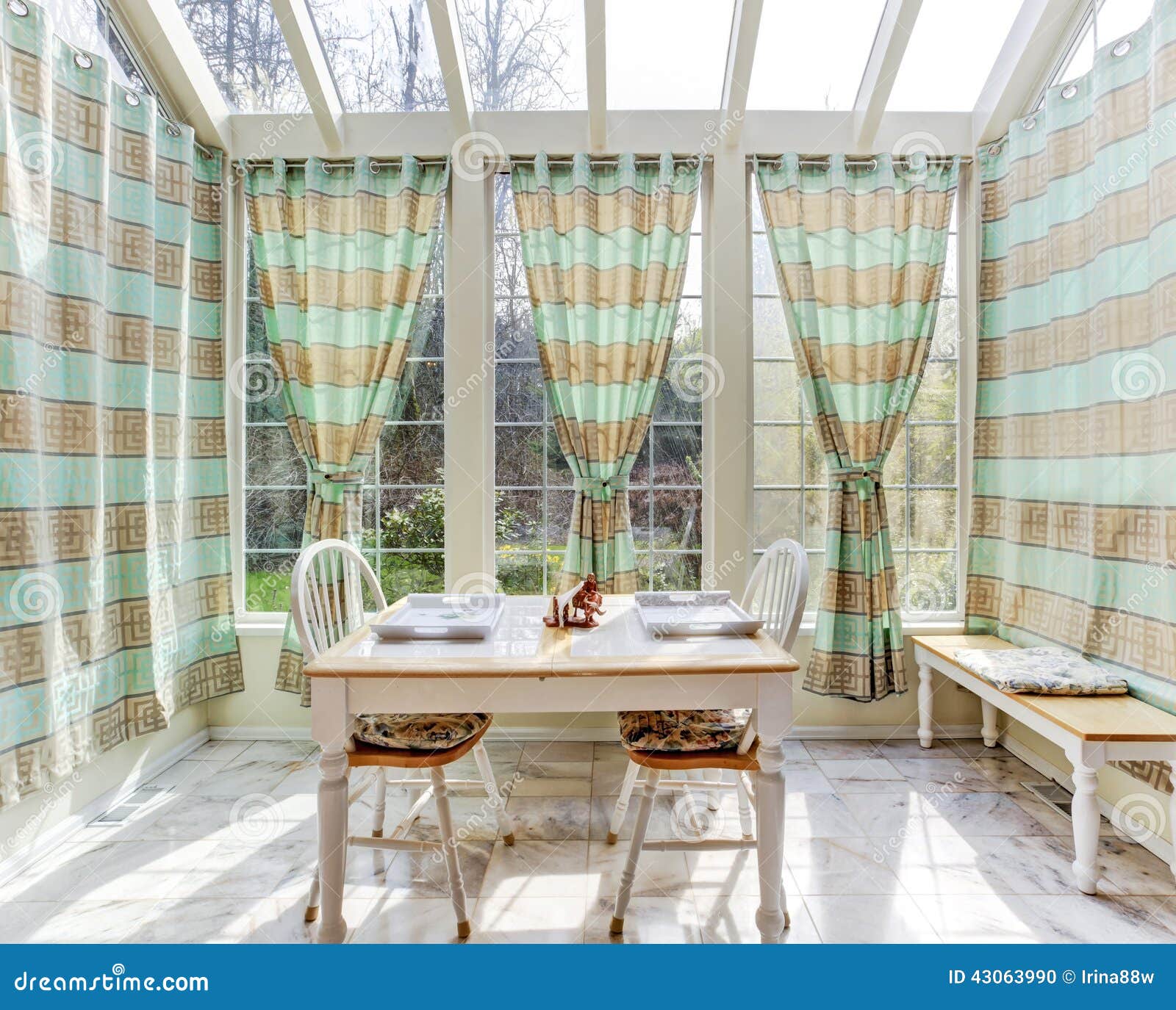 Bright Sun Room with Dining Table Set Stock Photo - Image of style ...
