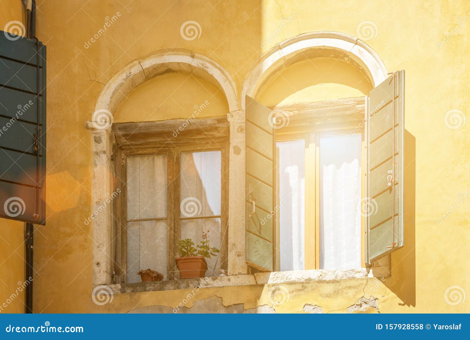 Bright Sunlight Reflected in Windows with Open Shutters in Old House ...