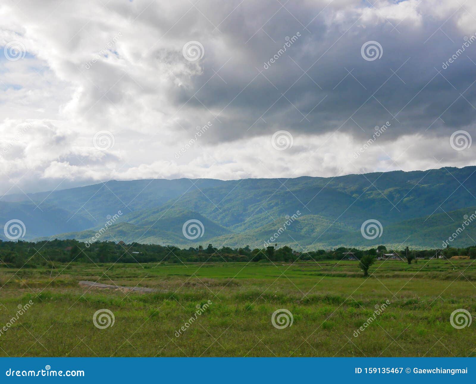 Bright Sunlight Shining through Dark Rainy Clouds after Rain Down on ...
