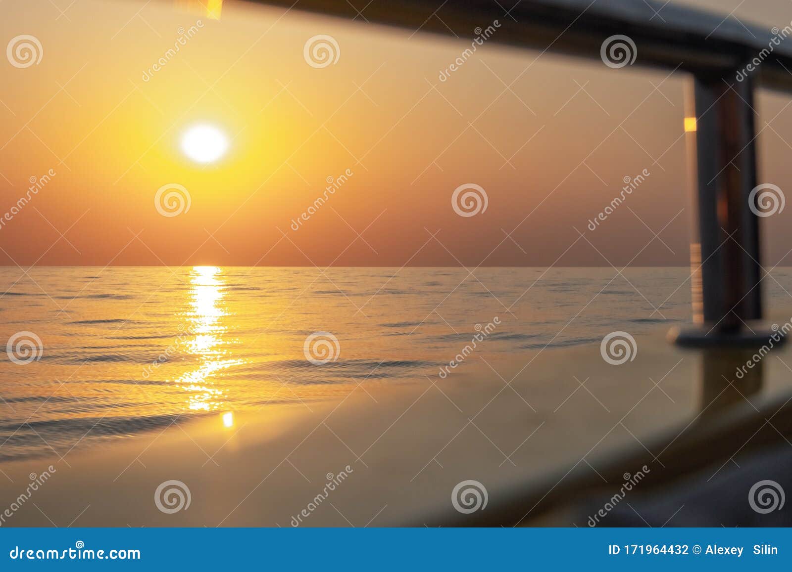 Bright Sunset with Large Yellow Sun Under the Sea Surface. Beautiful ...