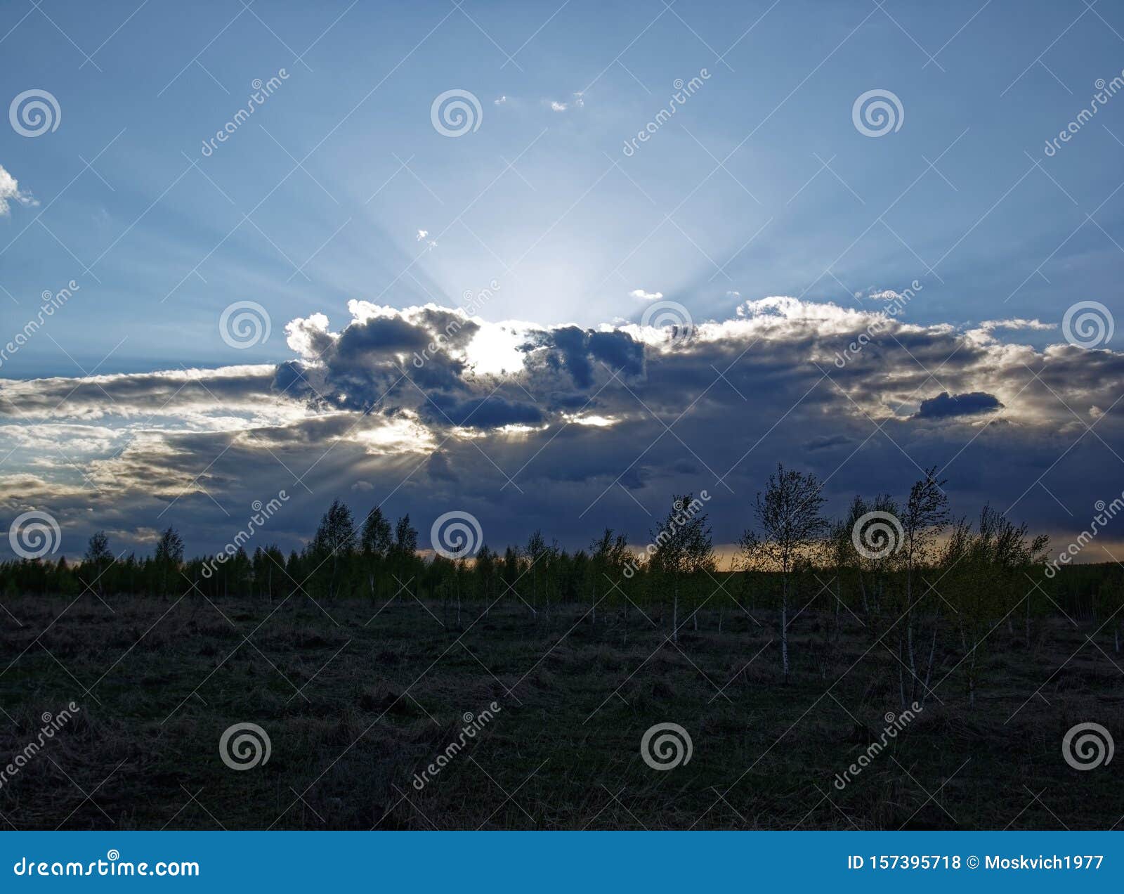 Bright Sunset in Spring through the Clouds Stock Photo - Image of ...
