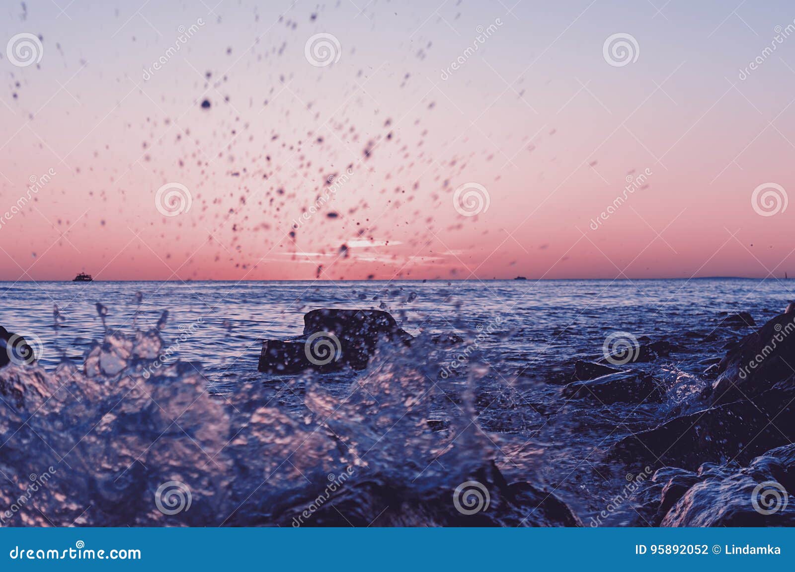 Bright Sunset Under the Sea with Waves Splashes. Stock Photo - Image of ...