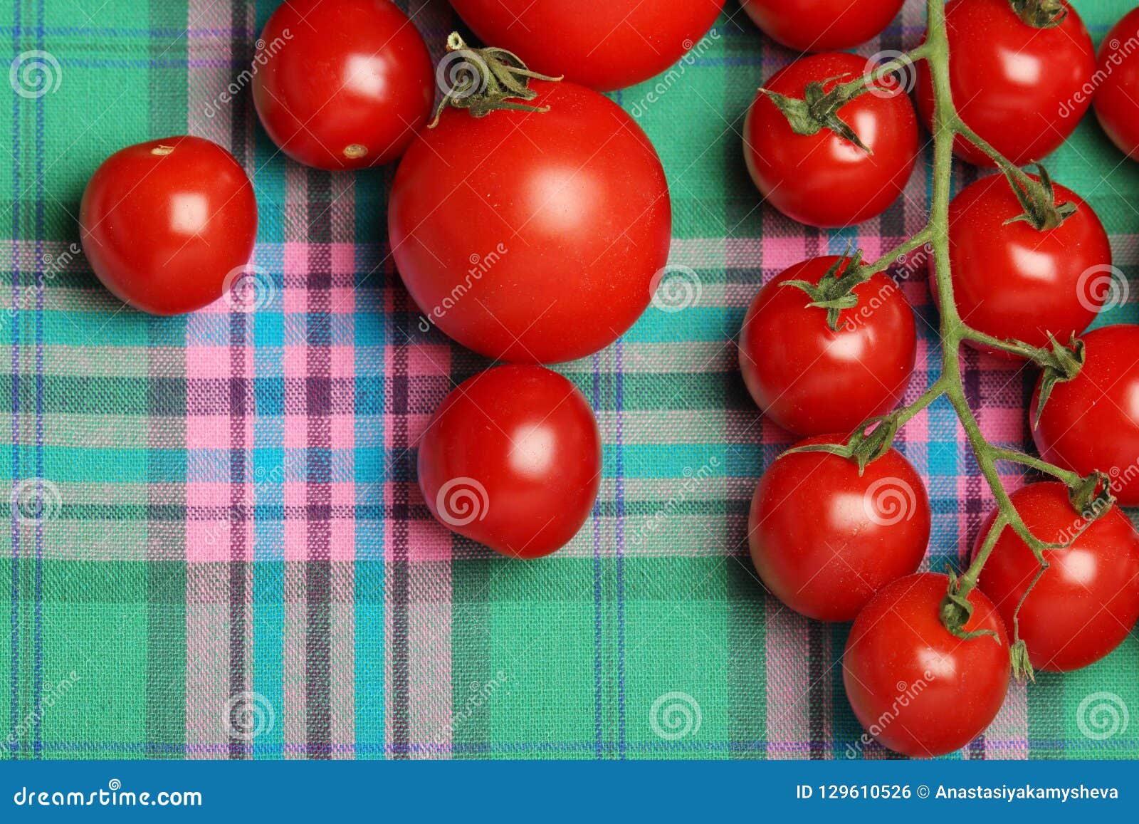 Tomatoes on the table stock photo. Image of nutrition - 129610526