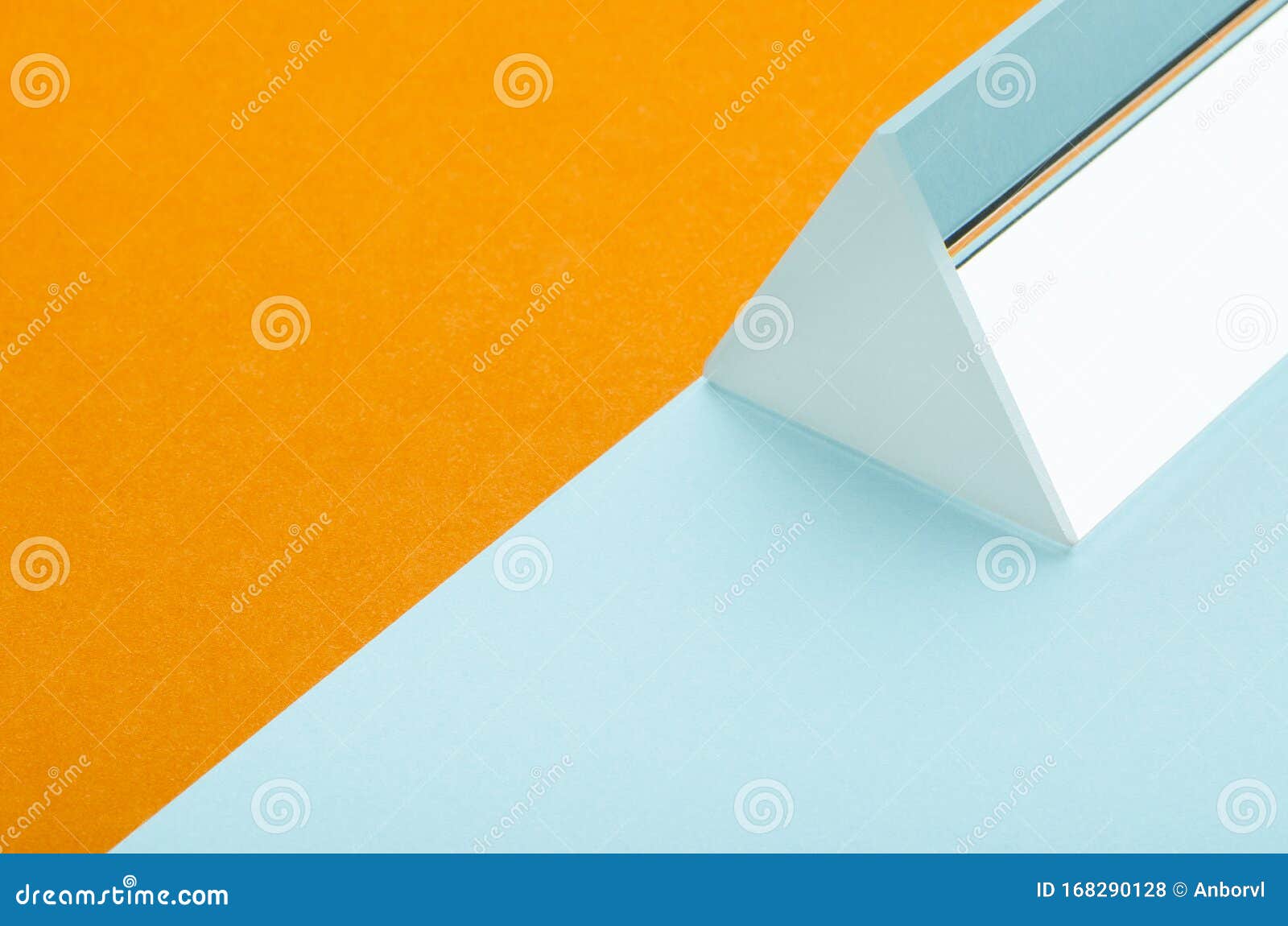 Bright Triangular Prism on Orange-blue Background Stock Photo - Image ...